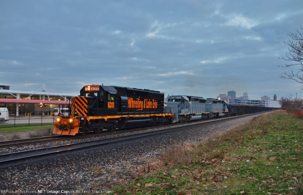 WE 6311 leads the stealth units and the loaded stone train.